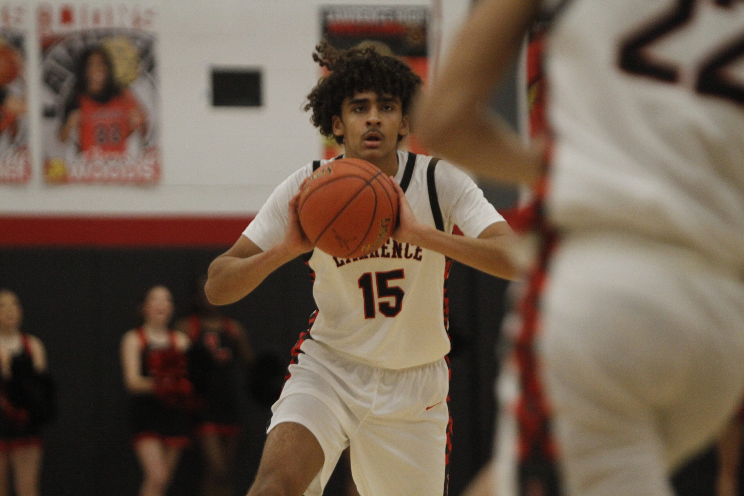 Lawrence boys, girls basketball teams drop home games against Olathe ...